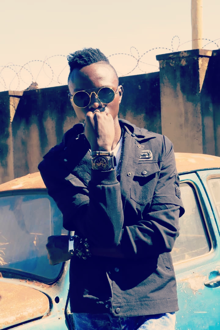 King Button Music, Songs, Videos, Mp3 Downloads and Biography - Howwe.ug